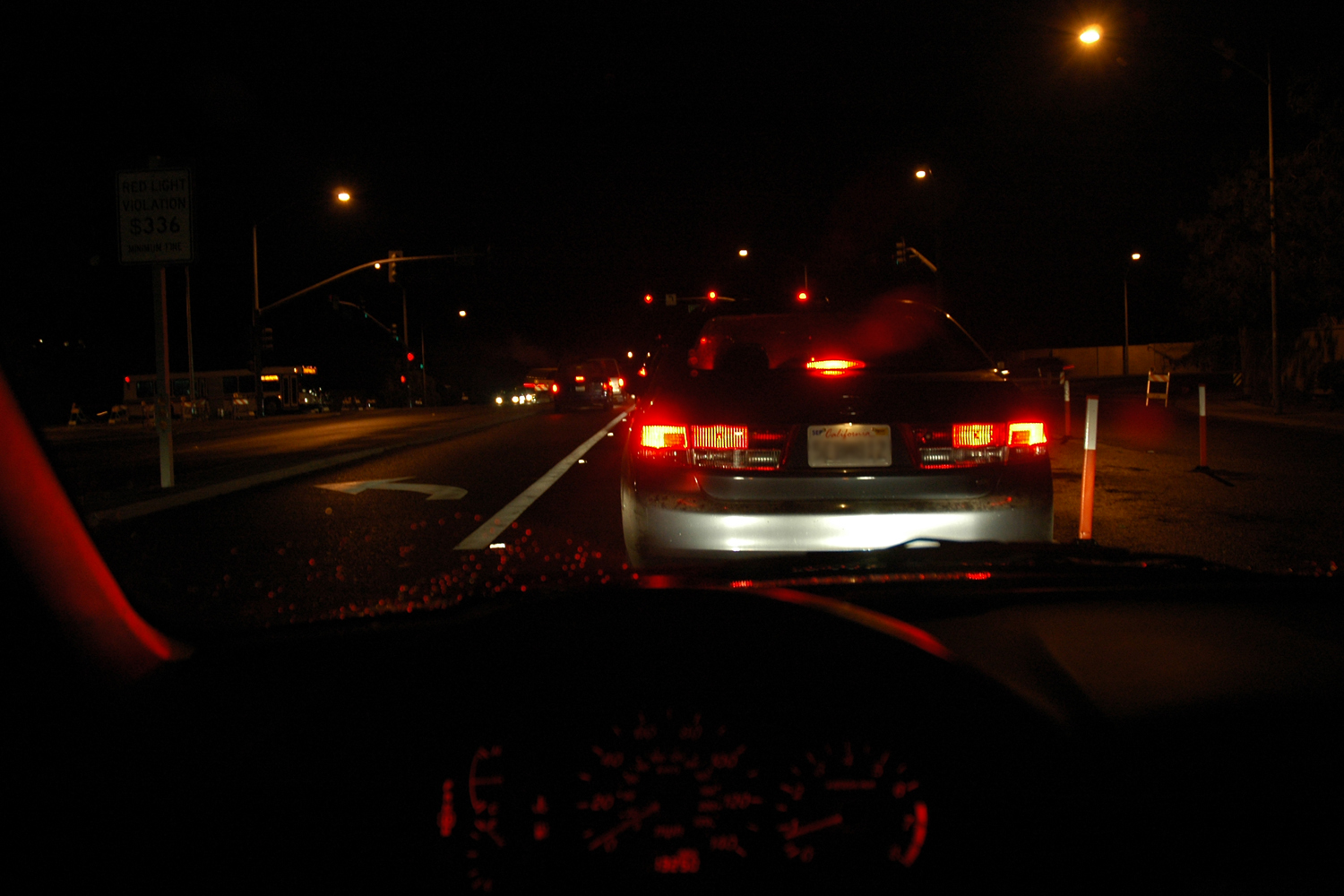 brake lights on a rainy night